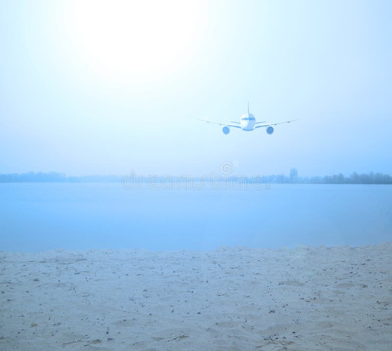 Airplane Over Water and Sand Stock Photo - Image of sand, nature: 213579102