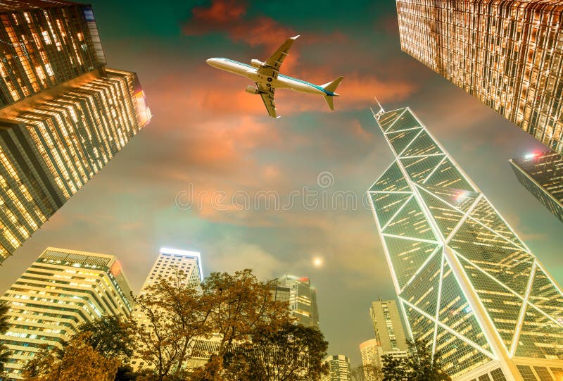 Airplane Overflying Hong Kong Financial District Stock Image - Image of ...