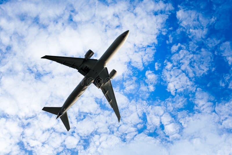 Airplane overhead flying stock photo. Image of plane - 45860764