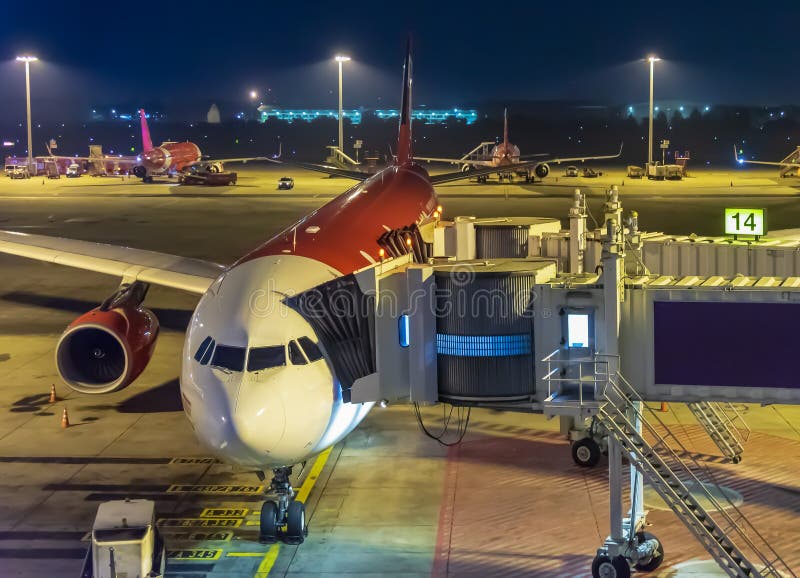 Airplane Parked at Airport Terminal after Arrival and Preparing for ...