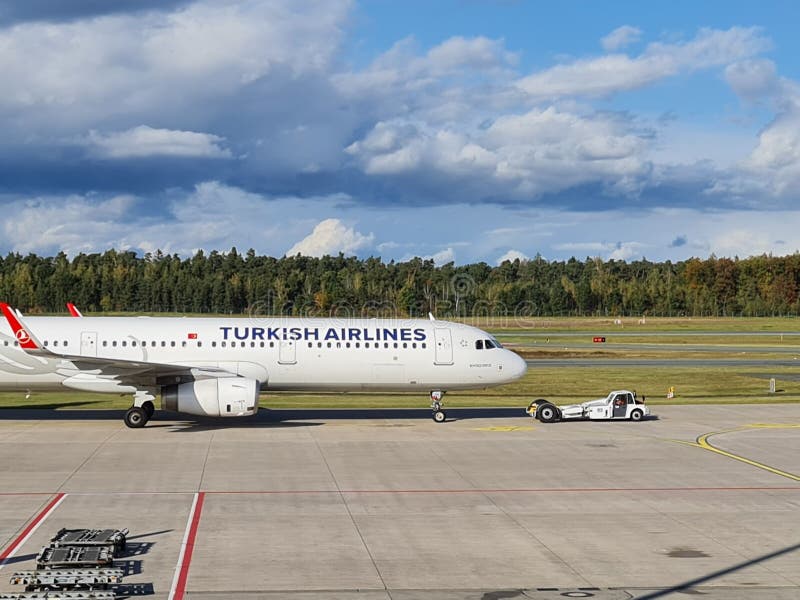 Airplane Parking in Airport Editorial Photography - Image of wing ...