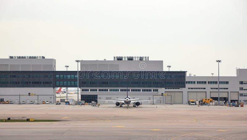 Airplane Parking at Parking Bay. Service Passengers by Bus from Bus ...