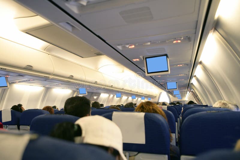 Airplane with Passengers Interior View Stock Image - Image of board ...