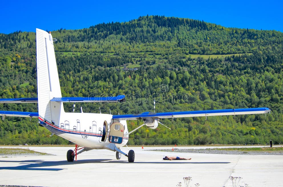 Airplane and Pilot, Georgia Stock Image - Image of airliner, arrival ...