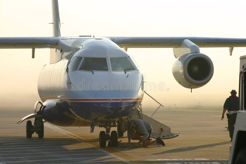 Airplane Pulling into Gate stock photo. Image of aircraft - 1016932
