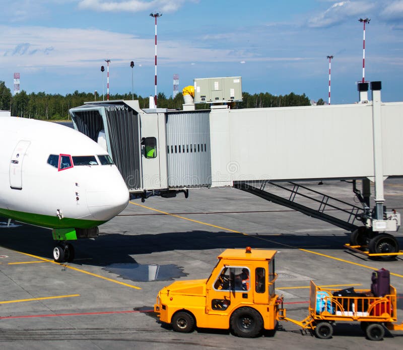 The Airplane and Ramp for Boarding Passengers Stock Photo - Image of ...