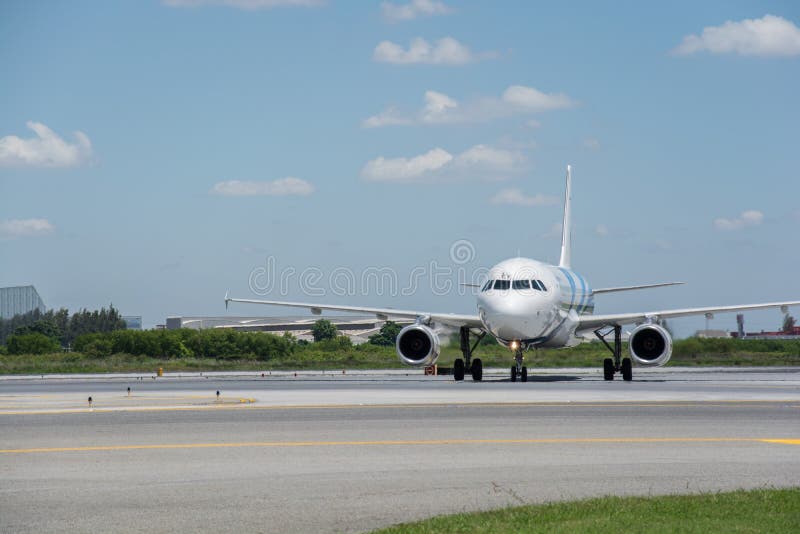 Airplane Ready To Take Off from Runway Stock Photo - Image of ...