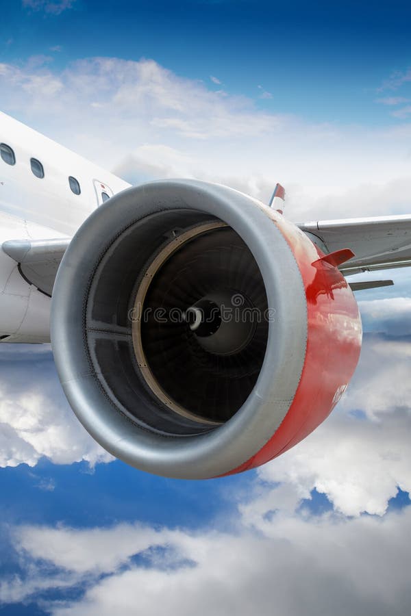 Airplane with Red Engine Flying in Stormy Clouds Stock Image - Image of ...