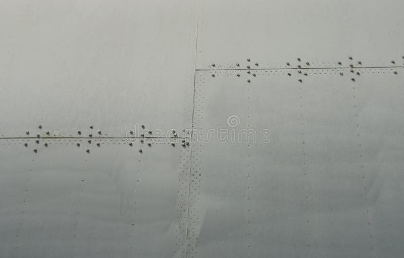 Rivets on aircraft skin stock image. Image of grey, joining - 33855063