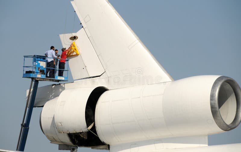 Airplane rudder removal editorial photography. Image of mechanics ...