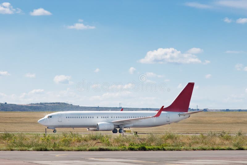 Airplane on the runway stock photo. Image of blurry, tail - 11118404