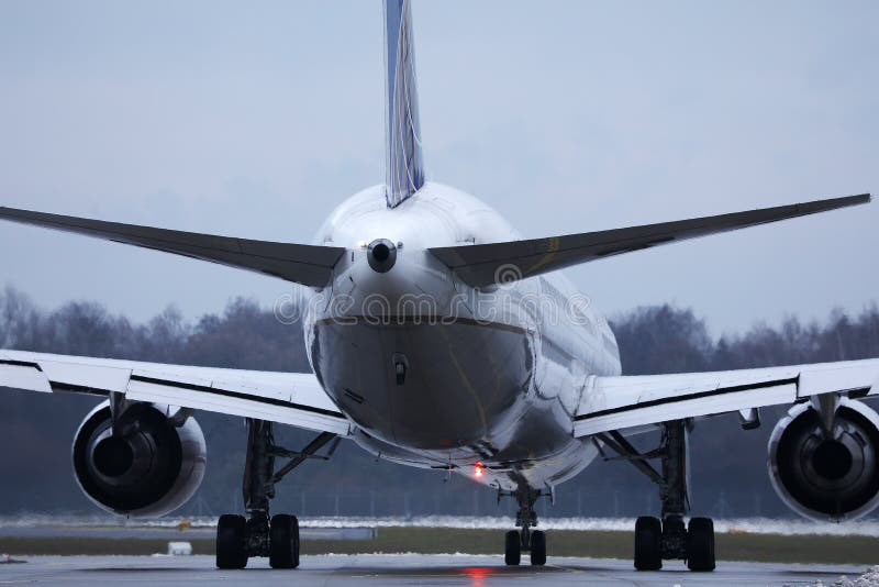 Airplane seen from back editorial stock photo. Image of apron - 141998418
