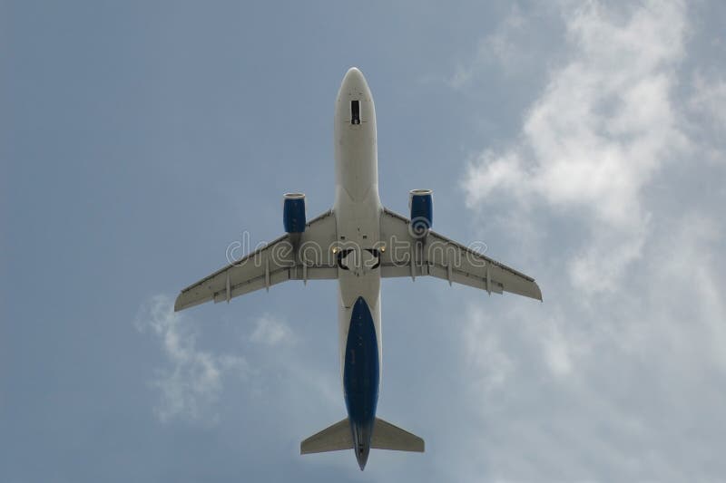 Airplane Seen from the Bottom Stock Image - Image of landing, horizon ...
