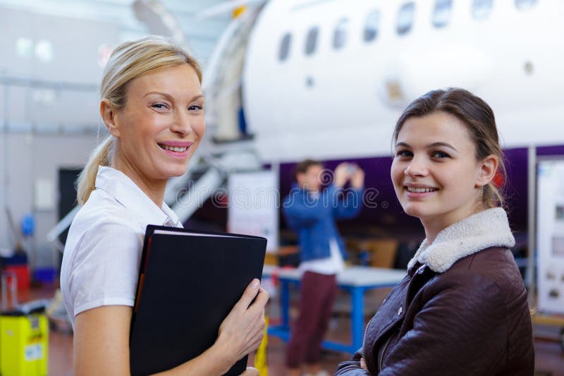 Airplane Service Crew Looking at Camera Stock Image - Image of aircraft ...