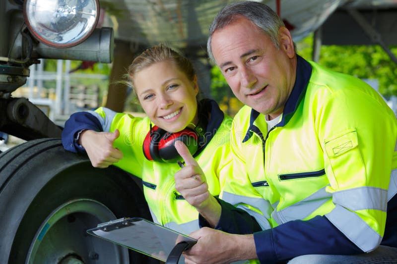 Airplane Service Crew Repairing Plane in Hangar Stock Image - Image of ...