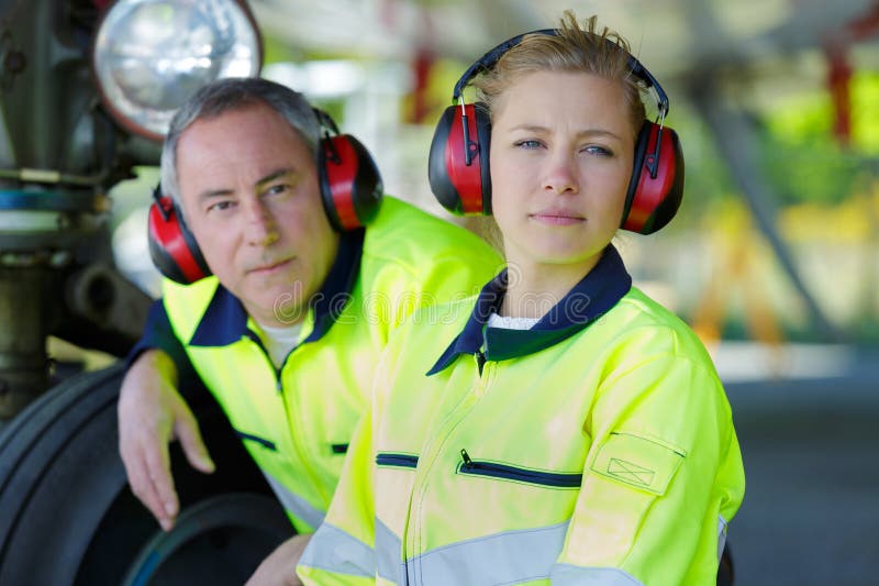 Airplane Service Crew Repairing Plane in Hangar Stock Image - Image of ...