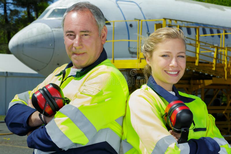Airplane Service Crew Repairing Plane in Hangar Stock Image - Image of ...
