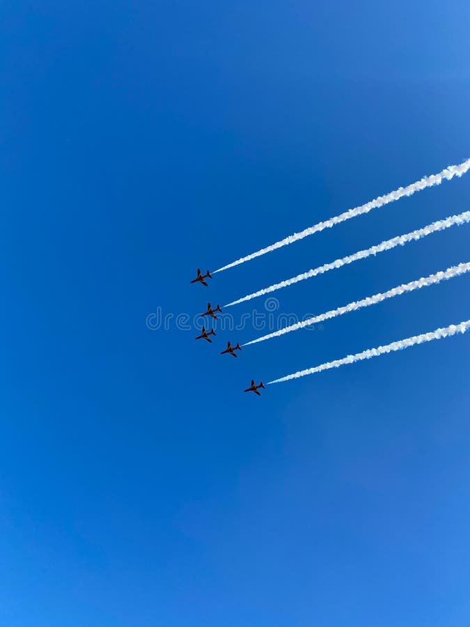 Airplane Show in the Sky with Straight White Smoke Stock Image - Image ...