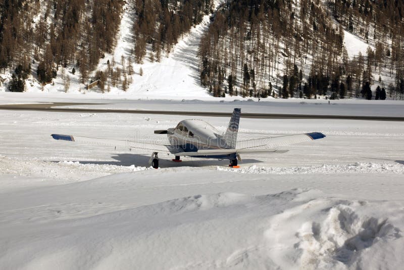 Airplane and Snow Mountain stock image. Image of blue - 3732849