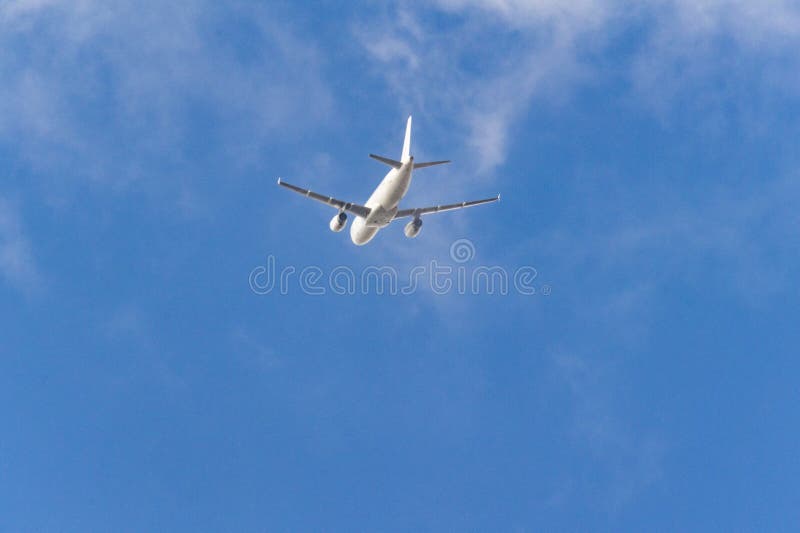 Airplane Soaring High in the Sky. Stock Photo - Image of vertical, view ...