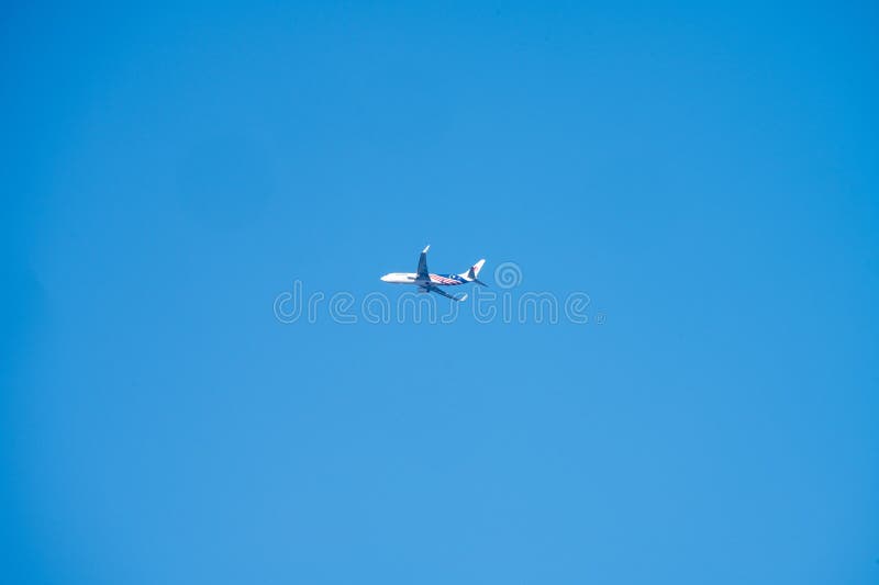 Airplane Soaring High in the Sky. Stock Photo - Image of vertical, view ...
