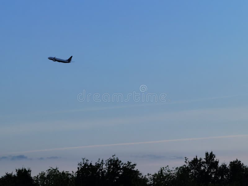 An Airplane on a Steep Slope after Take-off Stock Image - Image of ...