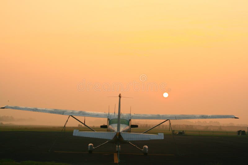 Airplane at sunrise stock image. Image of sunset, evening - 2658865