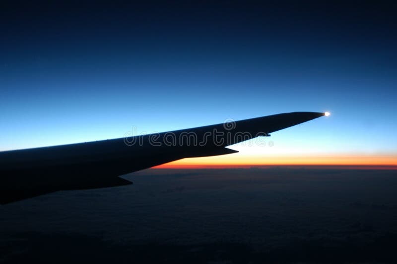 Airplane sunset stock photo. Image of plane, feet, colour - 9396