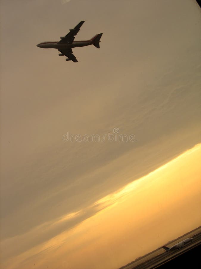 Airplane at sunset stock photo. Image of forces, aironautics - 1254040