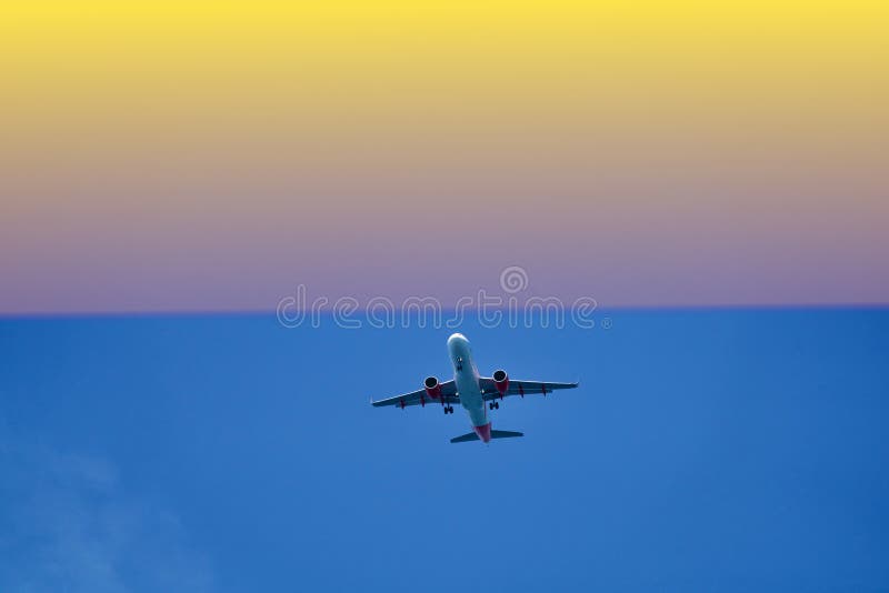 Airplane in a sunset stock image. Image of abstract - 155483439