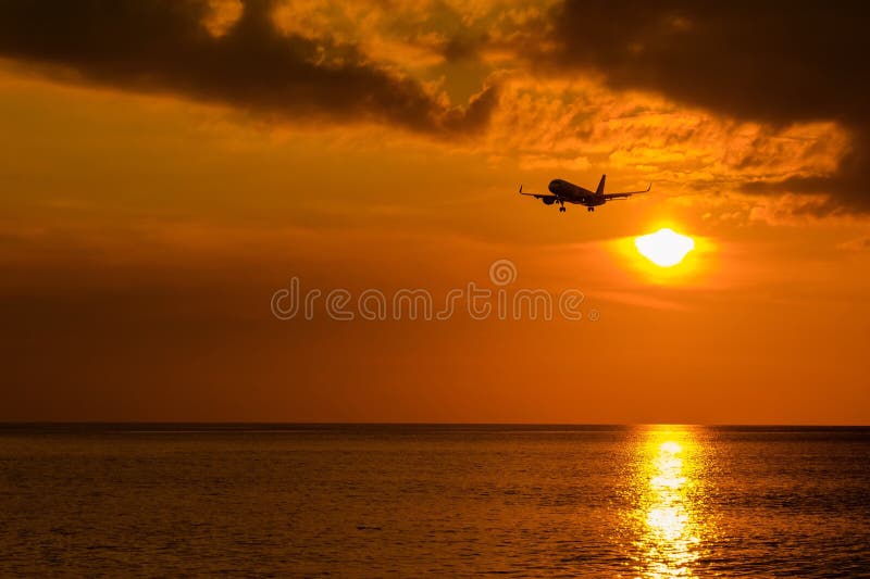 Airplane and sunset stock photo. Image of adventure - 147210680