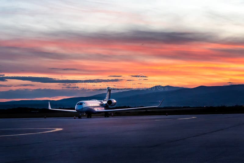 Airplane at Sunset - Back Lit Stock Photo - Image of europe, aviation ...