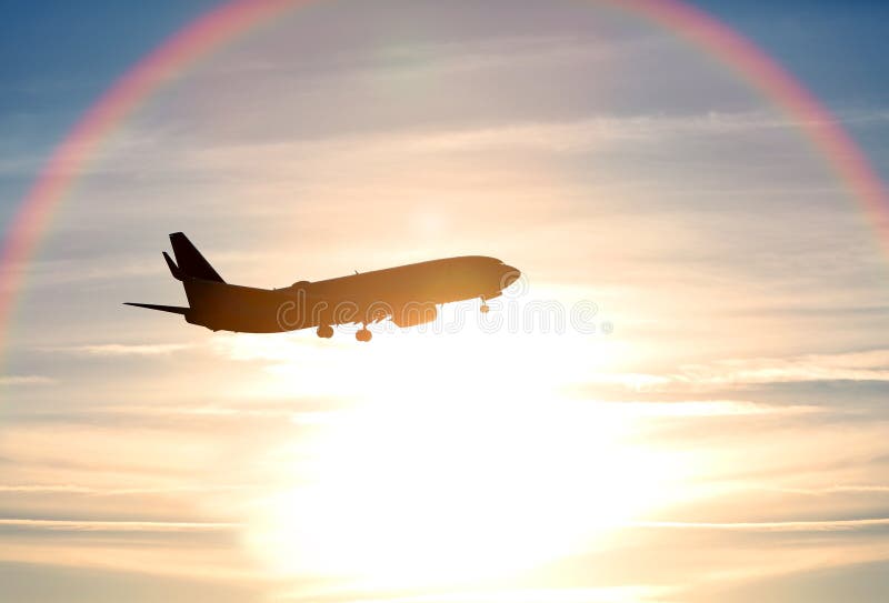 Airplane sunset stock image. Image of descending, lensflare - 30675135