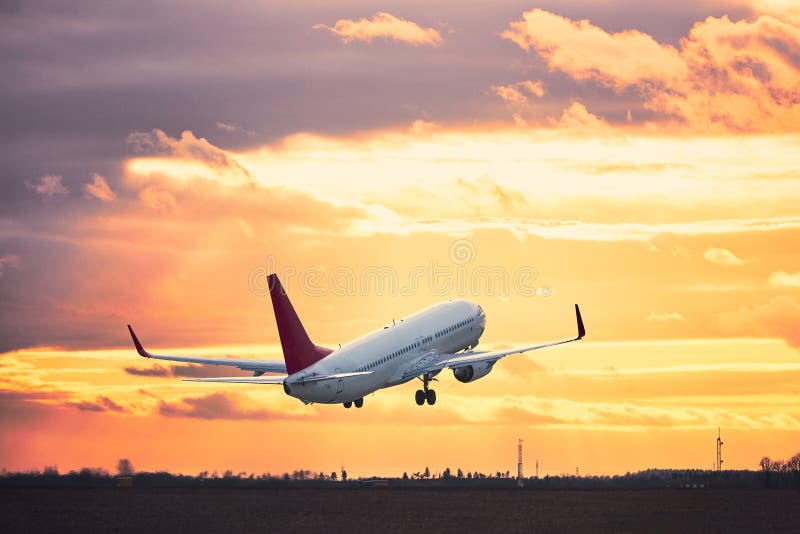 Take off at the sunset stock photo. Image of departure - 107669272