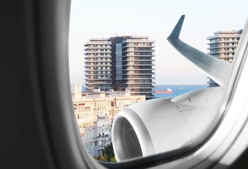 Airplane Taking Off or Landing, View on City from Window Stock Image ...