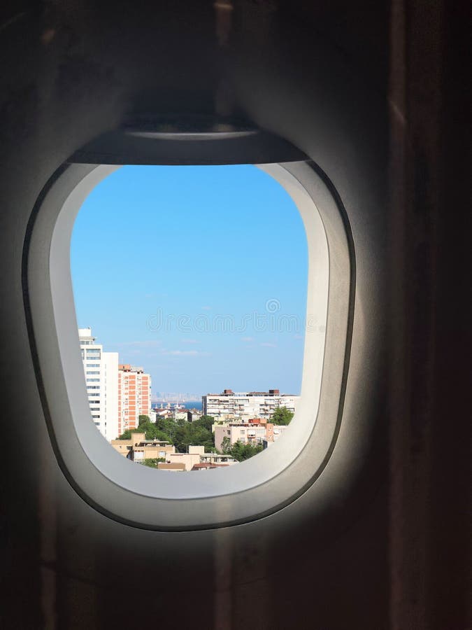 Airplane Taking Off or Landing, View on City from Window Stock Image ...