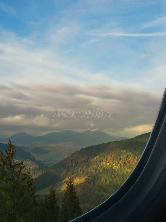 Airplane Taking Off or Landing, View on Mountains from Window Stock ...