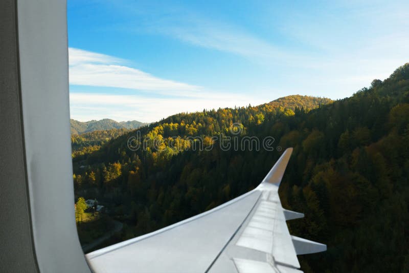 Airplane Taking Off or Landing, View on Mountains from Window Stock ...