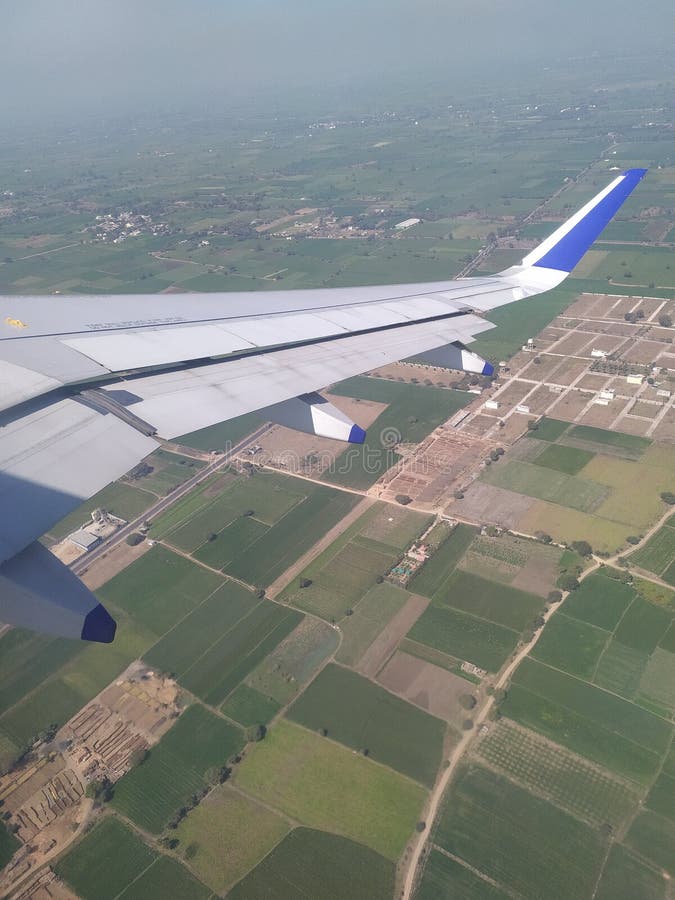 Airplane Taking Turn Over Green Farms Stock Photo - Image of aircraft ...