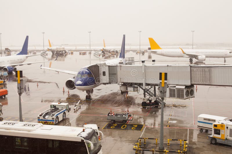 Airplane at the Terminal Gate in International Airport Stock Photo ...