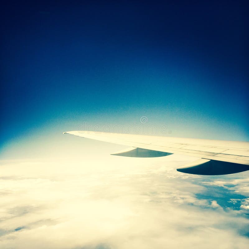Airplane tip over clouds stock photo. Image of cloudy - 71935178