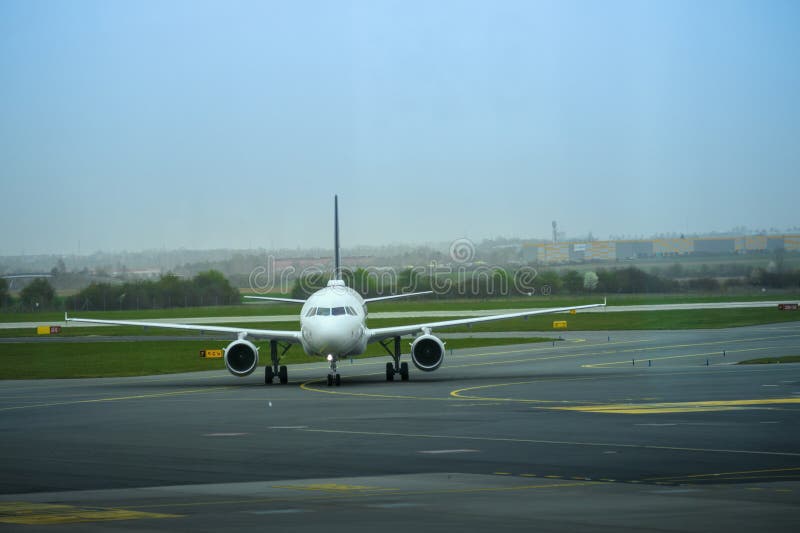 .an Airplane about To Take Off from an Airport Runway Stock Photo ...