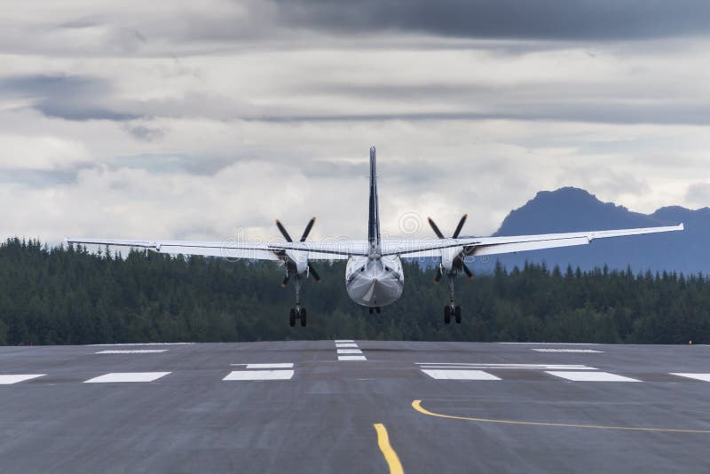 Airplane Touchdown on Landing Path Back View Tele Lens Stock Photo ...