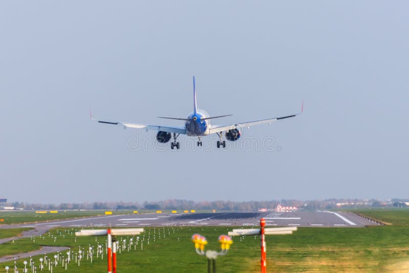 Airplane before Touching on Runway, Rear View Stock Image - Image of ...