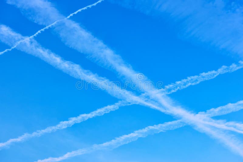 Airplane trails in the sky stock photo. Image of contrail - 133697760