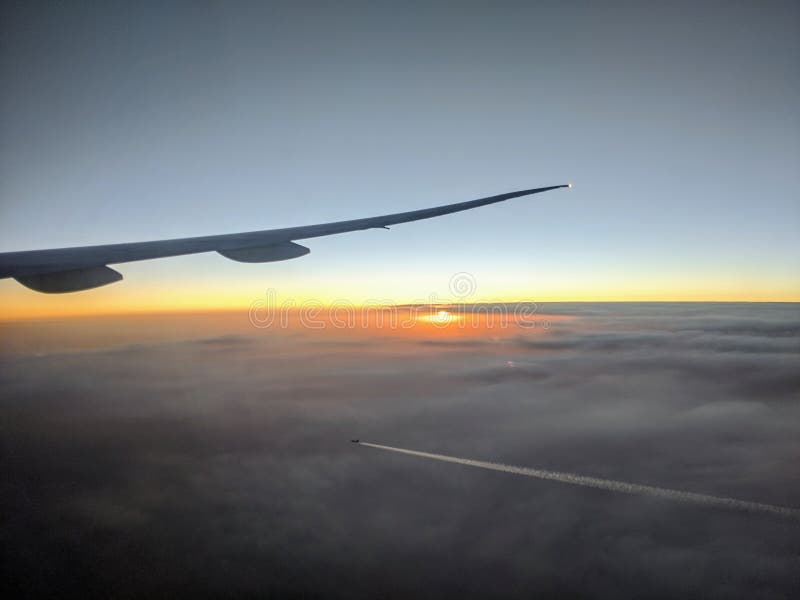 Airplane Wing Aerial View of Sunset and Clouds Stock Photo - Image of ...
