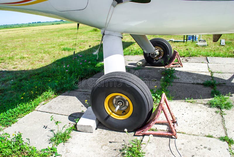 Airplane Wheel. Small Private Plane Parking in Summer Airfiled Stock ...