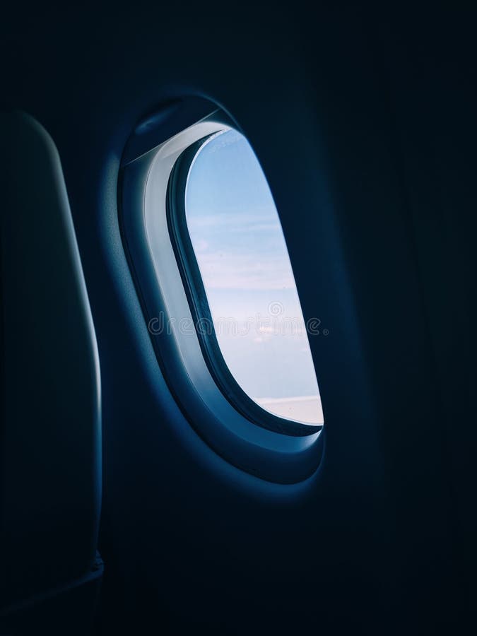 Airplane Window Facing the Sky Stock Image - Image of circle, brand ...