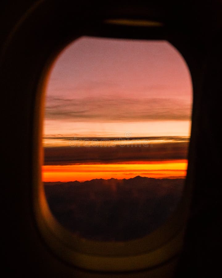 Sunset in Airplane Window in Flight Stock Image - Image of blue ...