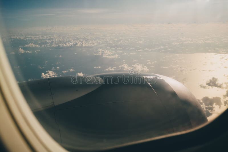 Airplane Window View with Engine and Clouds. Stock Image - Image of ...